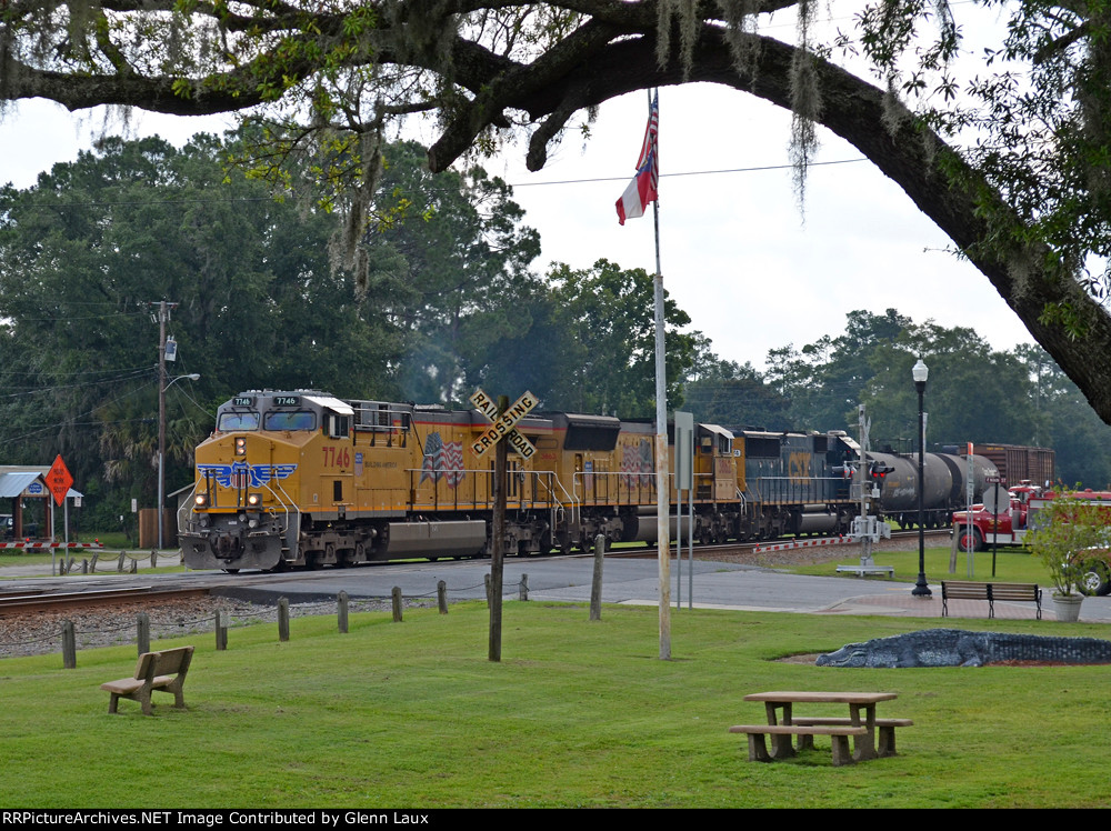 UP 7746, 3862 and CSX 8574 lead a northbound mixed freight